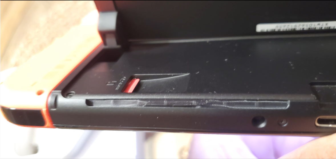 switch_oled_back - Wololo.net